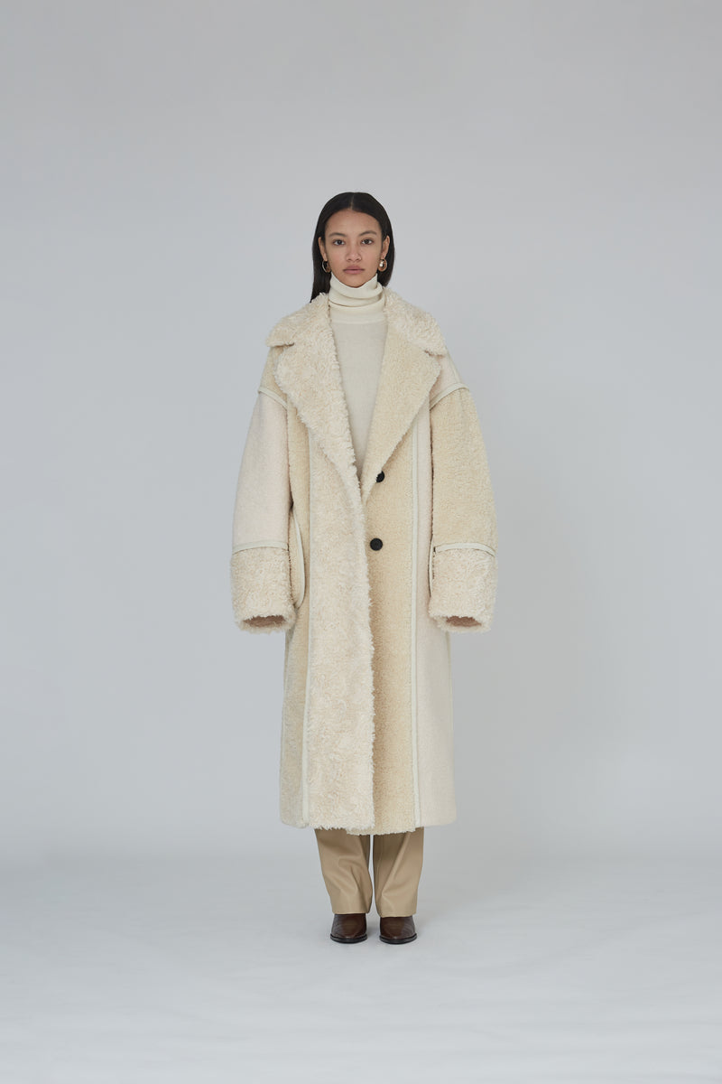 Inverted-seam faux shearling patchwork coat – GOEN.J